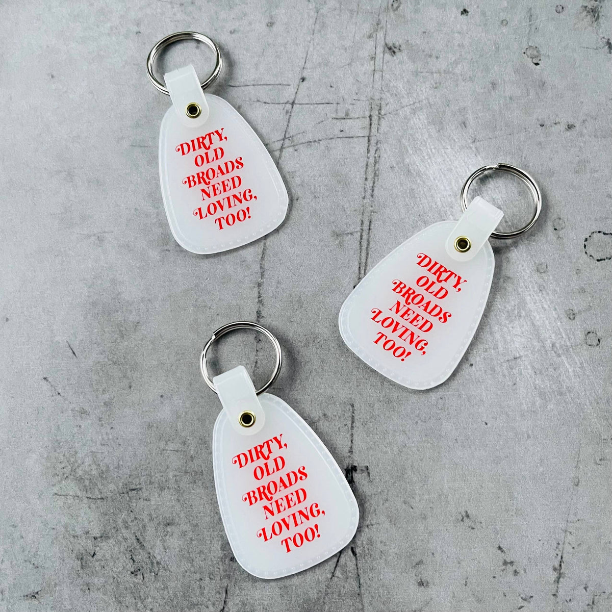 Dirty Old Broads Need Loving Too Saddle Keychain – River City Coffee ...